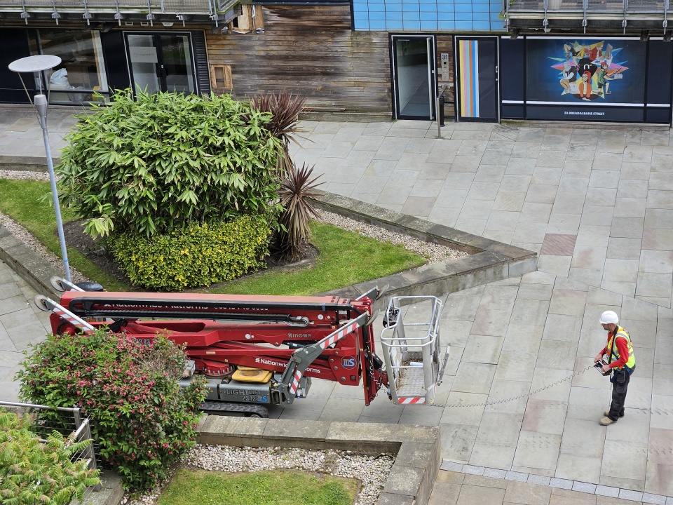 Man taking cherry picker for a walk | ArcLight | Blipfoto