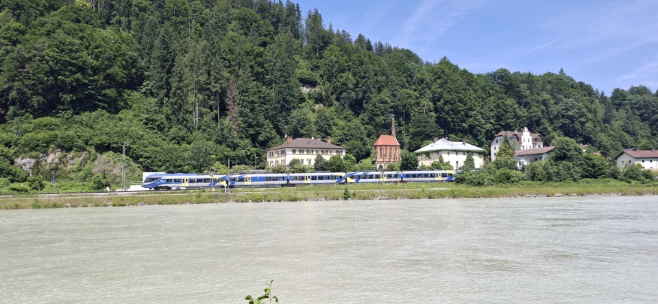 Train along the banks of the Inn, Germany | Marten | Blipfoto